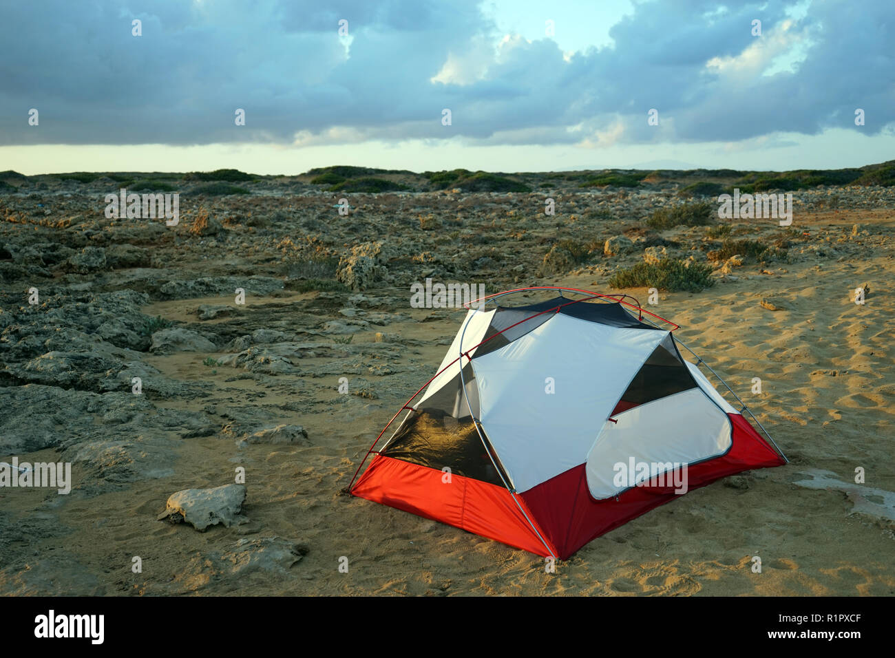 Tent on the sand and rock Stock Photo - Alamy