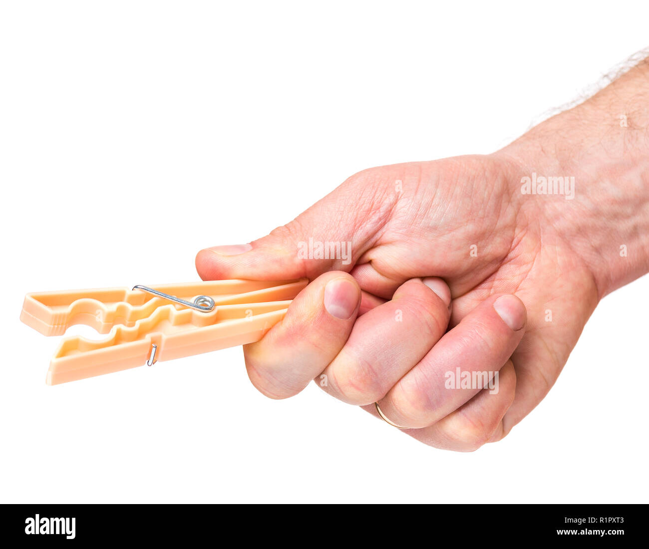 Hand with color clothespin Stock Photo - Alamy