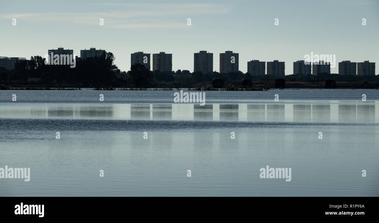 High contrast back light of touristic buildings near lake Stock Photo ...
