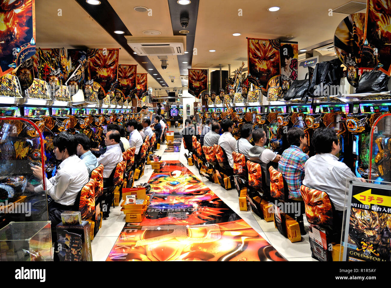 People play Pachinko, the traditional Japanese gambling in Tokyo, Japan ...
