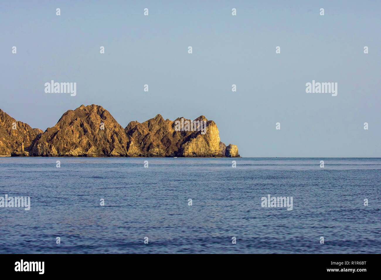 Picturesque cosat line and rock cliff near Muscat, Oman Stock Photo - Alamy