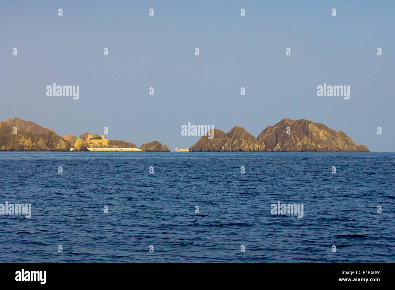 Picturesque cosat line and rock cliff near Muscat, Oman Stock Photo - Alamy