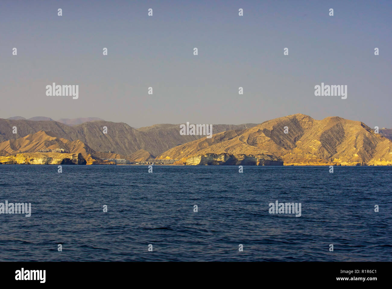Picturesque cosat line and rock cliff near Muscat, Oman Stock Photo - Alamy