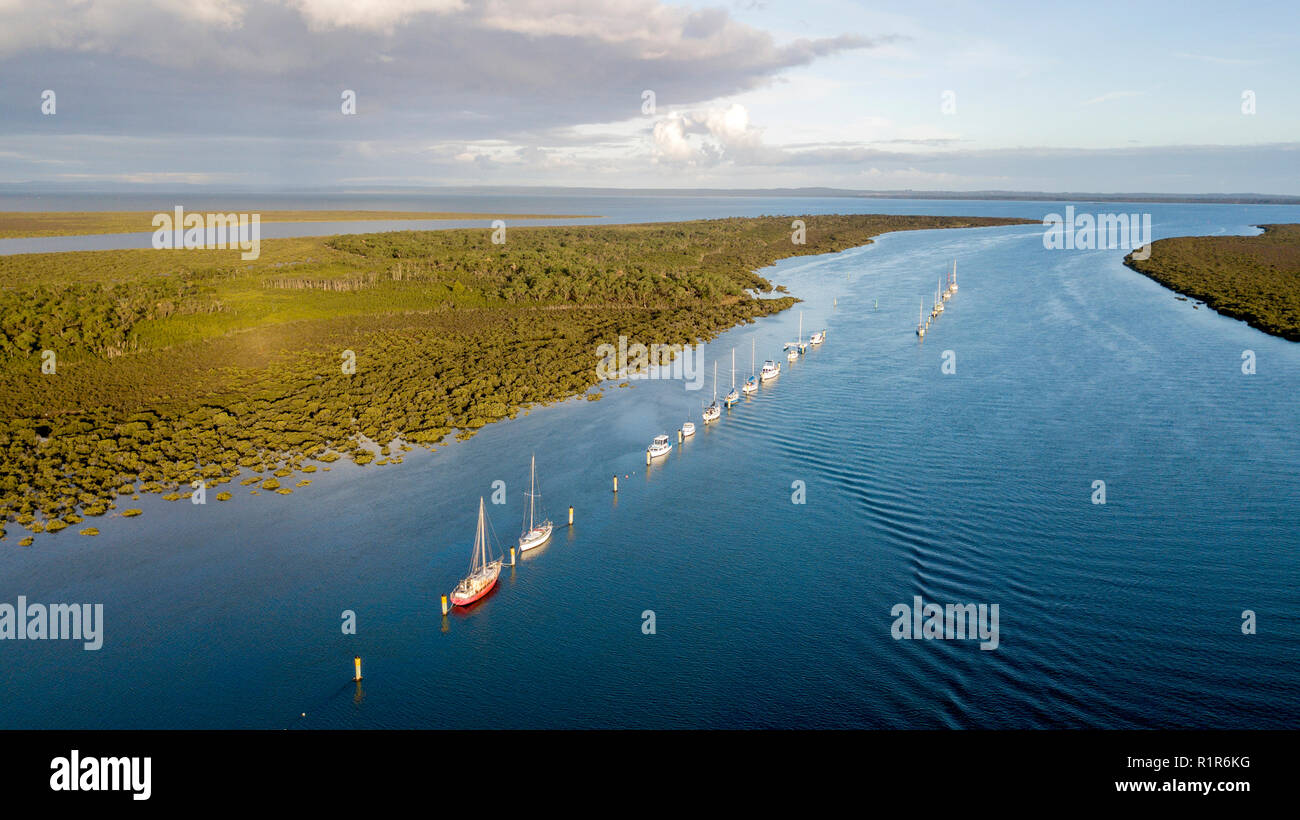 boats at anchorage in the river with sea entrance aerial photo Stock ...