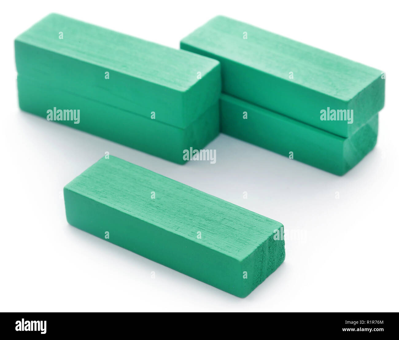 Jenga game of colorful wooden blocks over white background Stock Photo ...