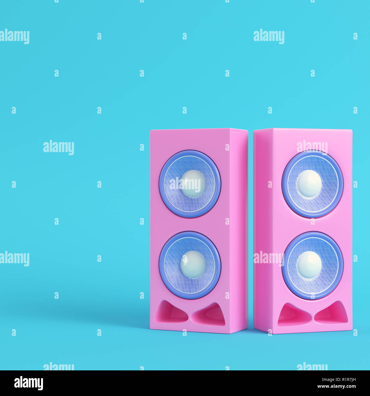 Pink stereo speakers on bright blue background in pastel colors ...