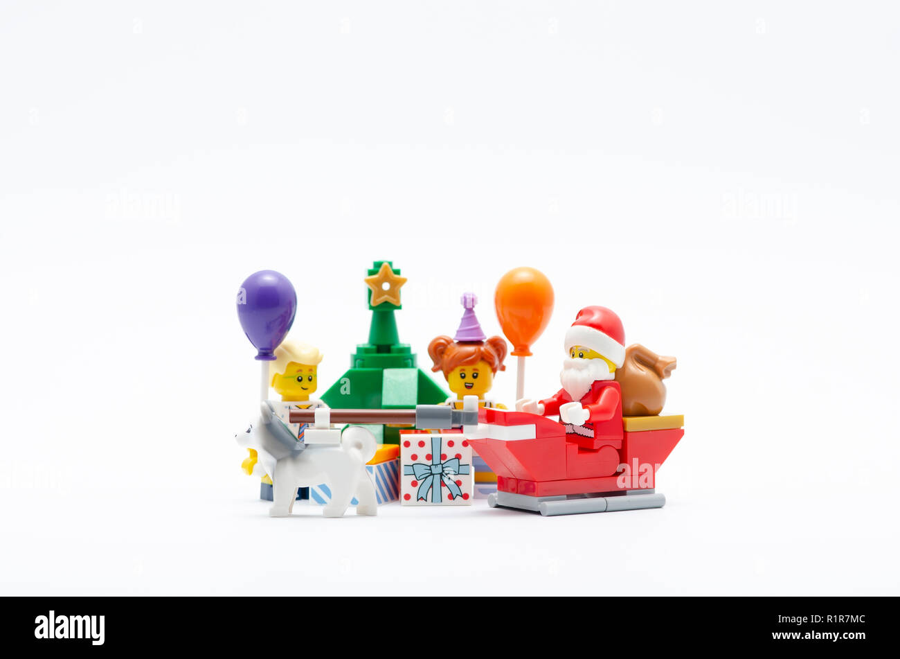 lego santa clauss and others people celebrating with christmas tree and ...