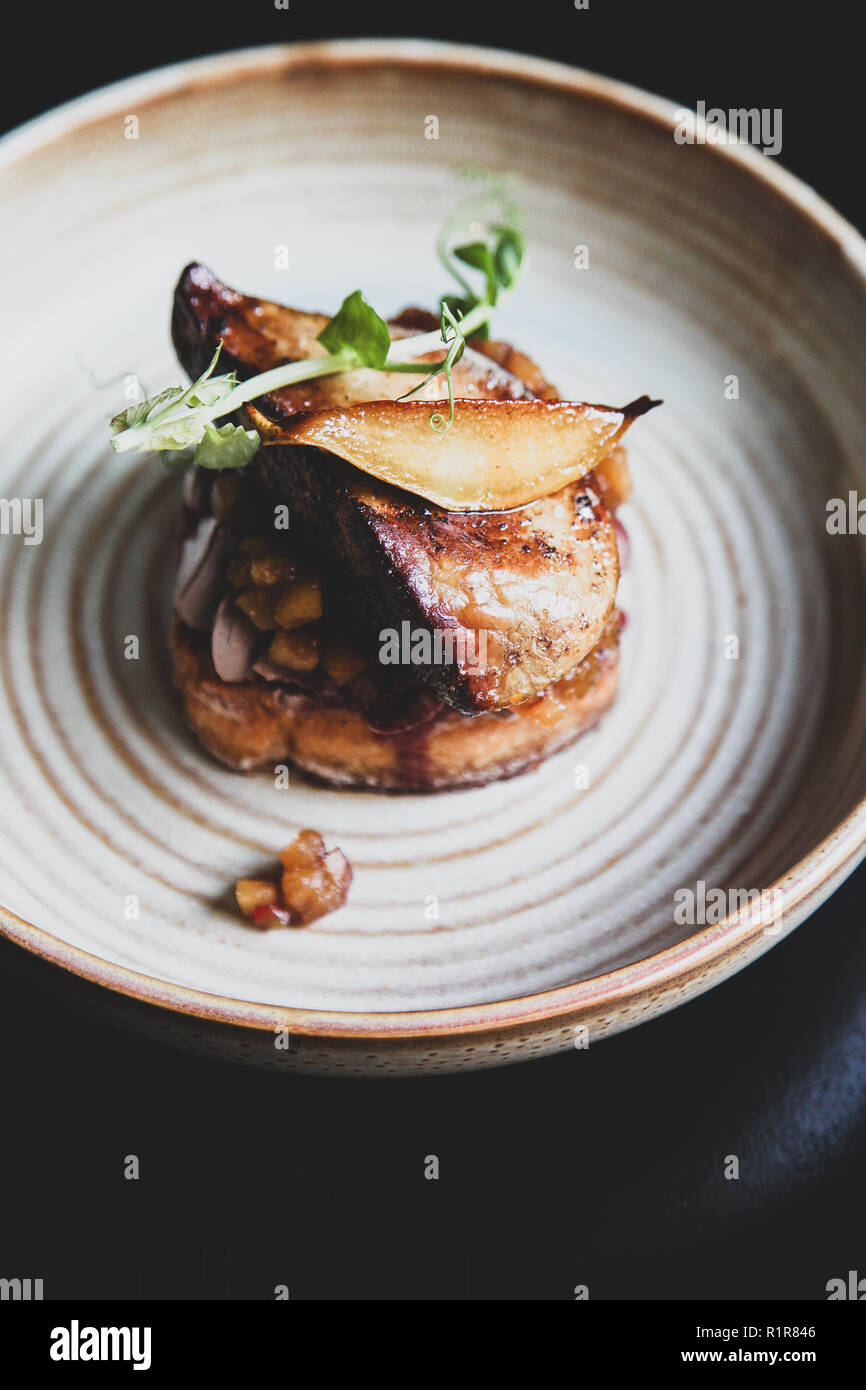 Esthetic French foie gras with apple and pear chutney on the toast in ...