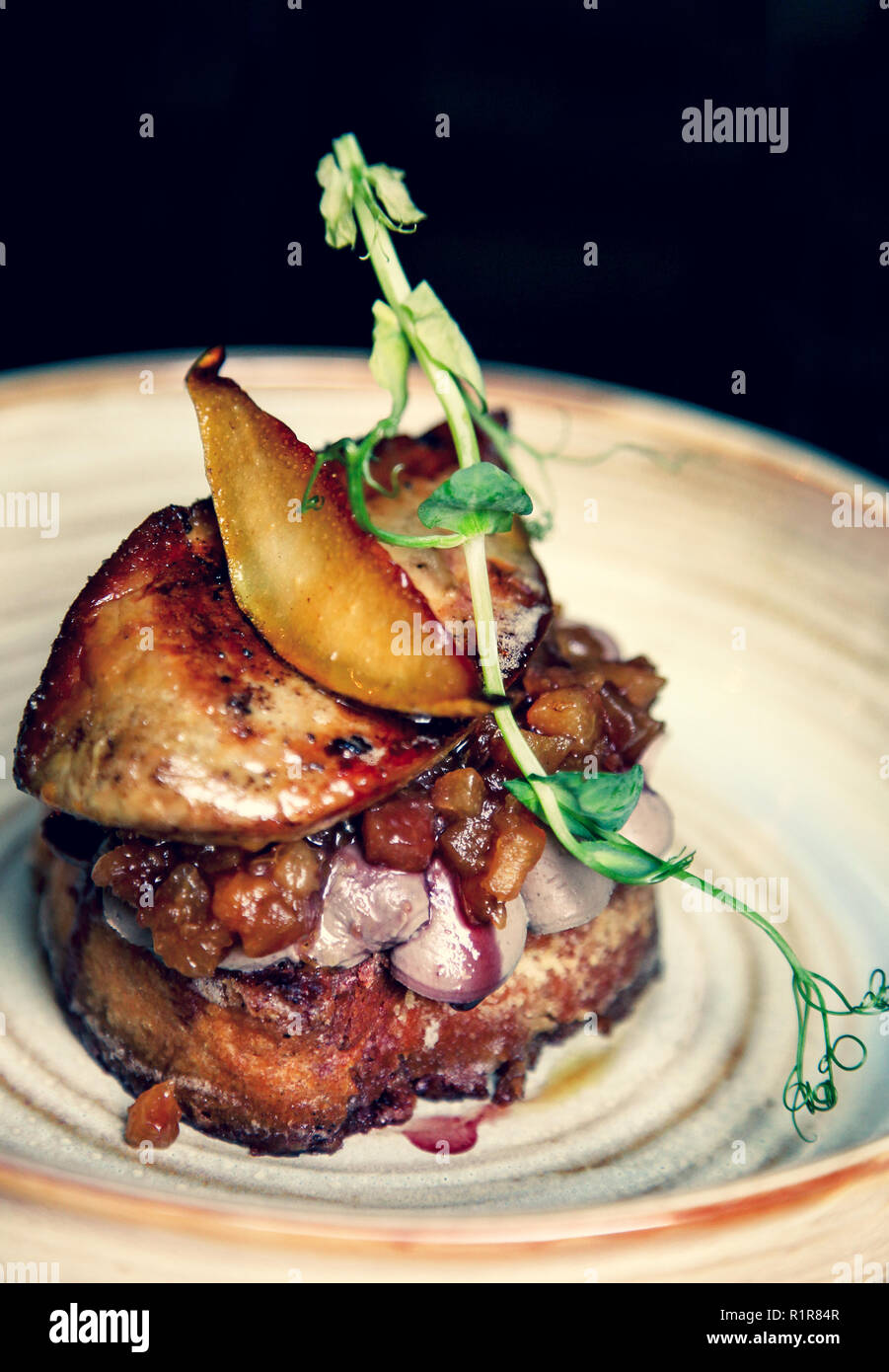 Esthetic French foie gras with apple and pear chutney on the toast in ...
