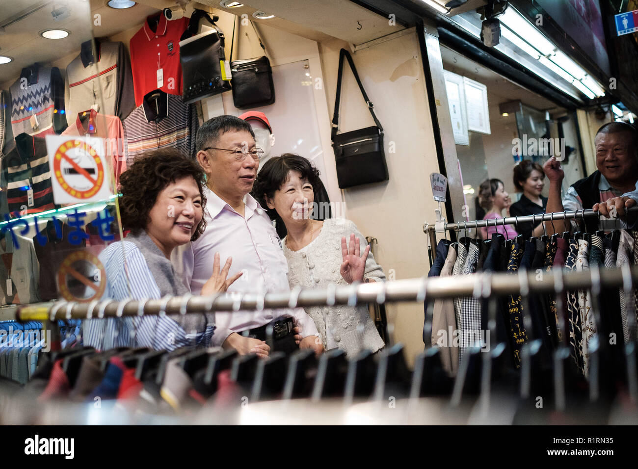 Taipei city mayor and city mayoral candidate Ko Wen-je poses with his ...