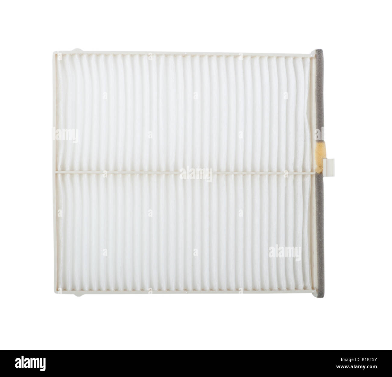 New flat engine air filter in a plastic case isolated on white ...