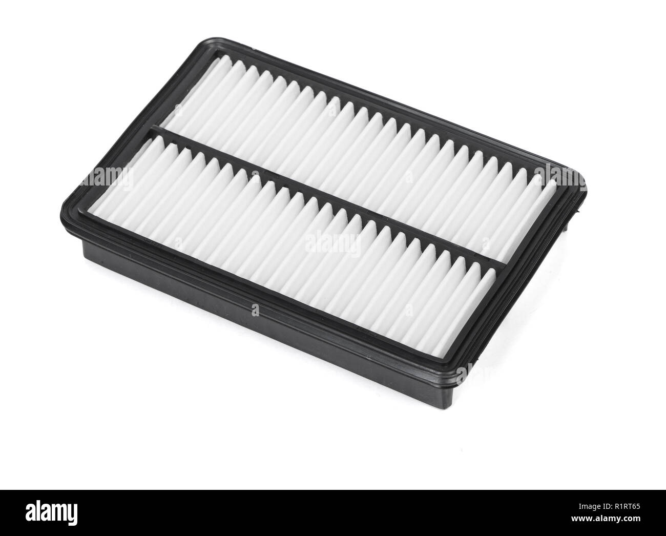 Unused flat engine air filter in a plastic case isolated on white ...