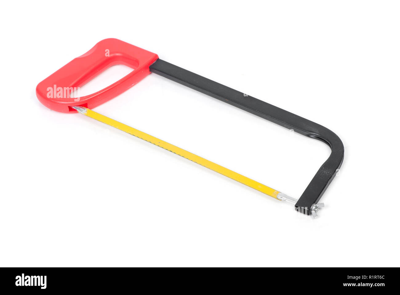 Hacksaw with red handle isolated on white Stock Photo - Alamy
