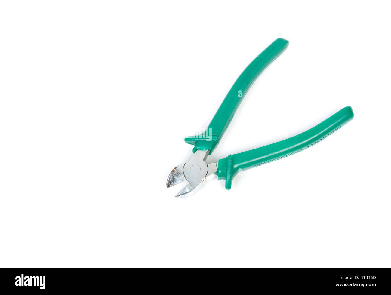 Wire cutter pliers with green handles isolated on white background ...