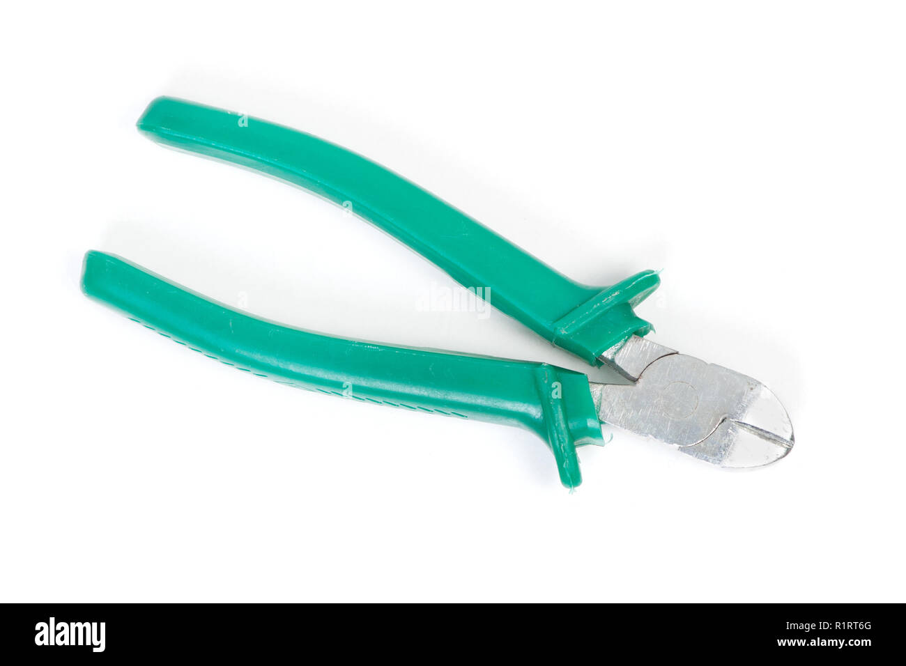 Wire cutter pliers with green handles isolated on white background ...