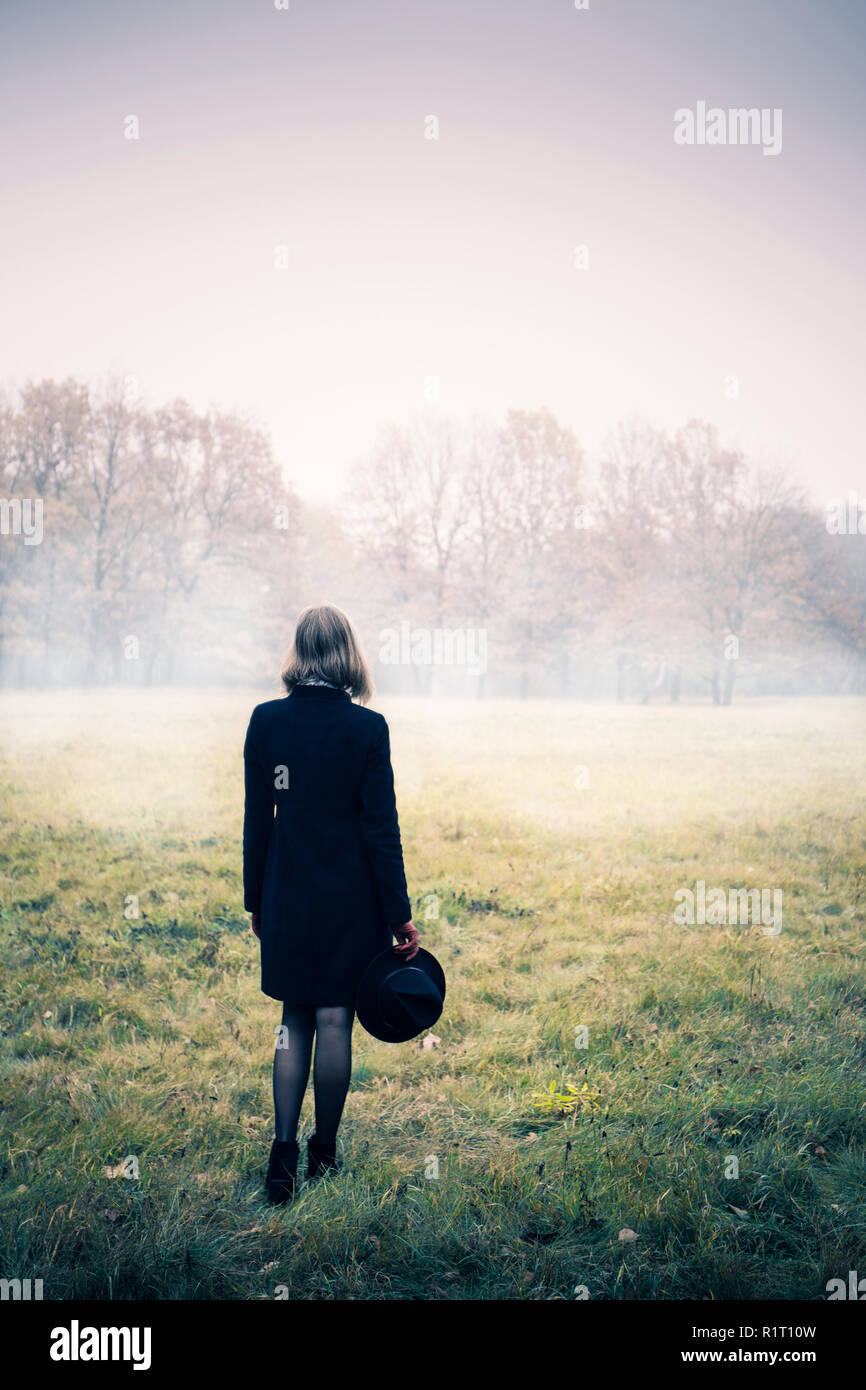 Silhouette of woman behind fog hi-res stock photography and images - Alamy
