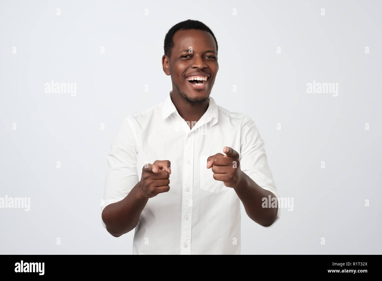 I choose you concept. Smiling business man pointing you saying You are ...