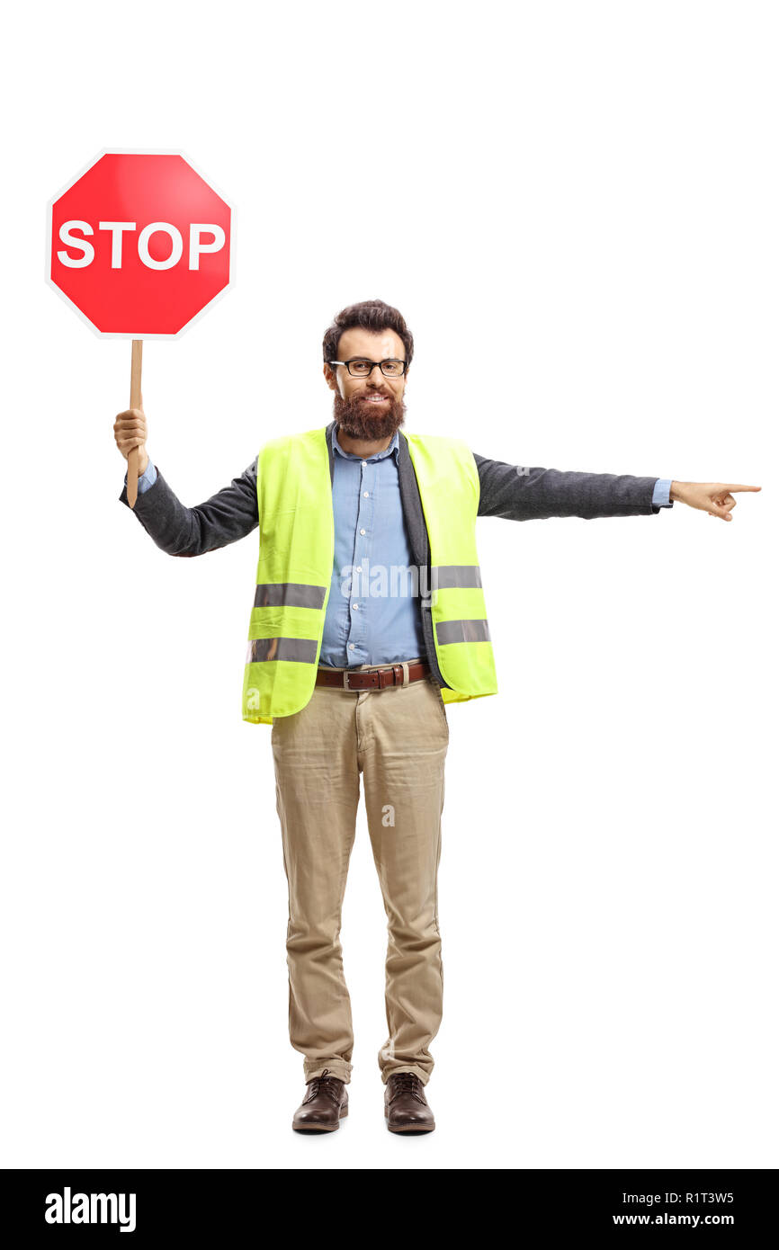 Full length portrait of a man with a safety vest holding stop sign and ...