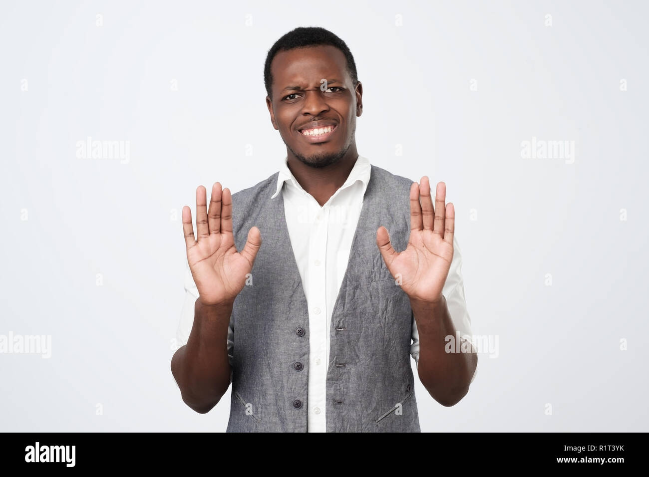 Attractive African Male Showing Refusal Gesture Like Saying Leave Me