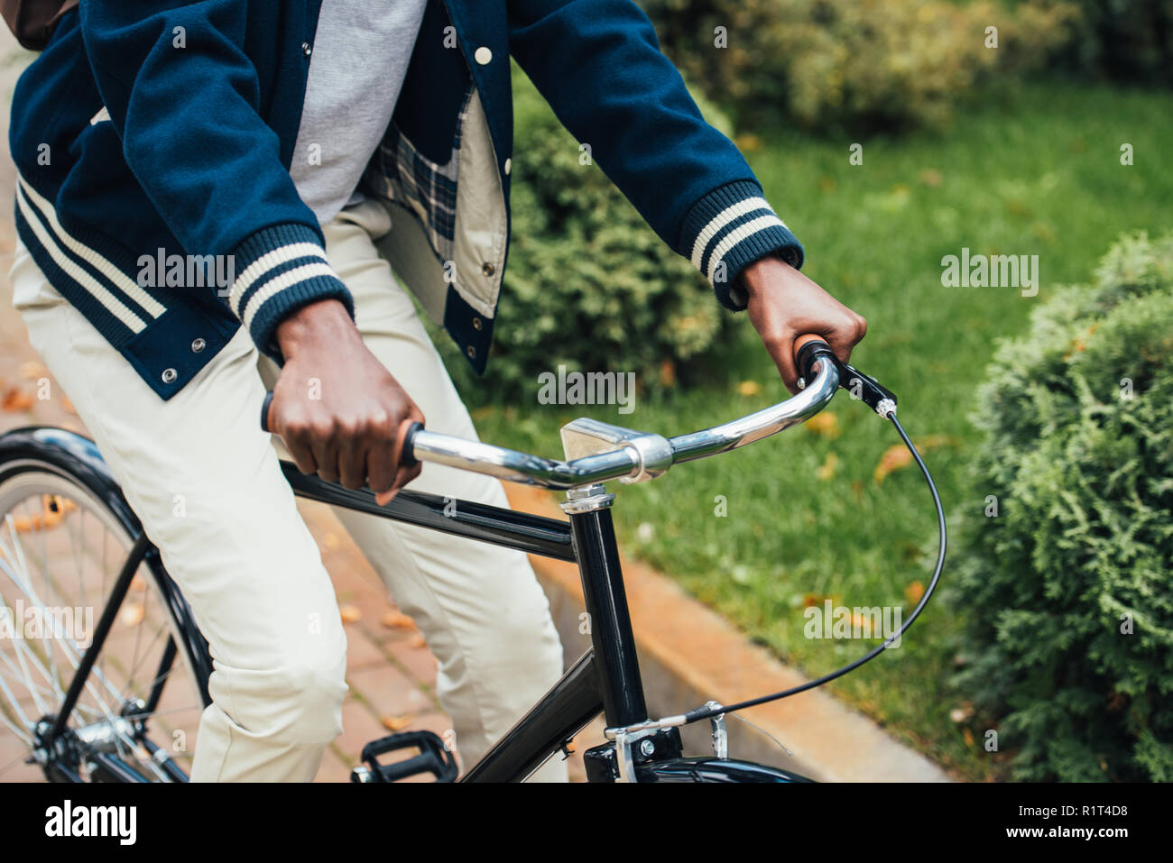 African american man riding bicycle hi-res stock photography and images ...