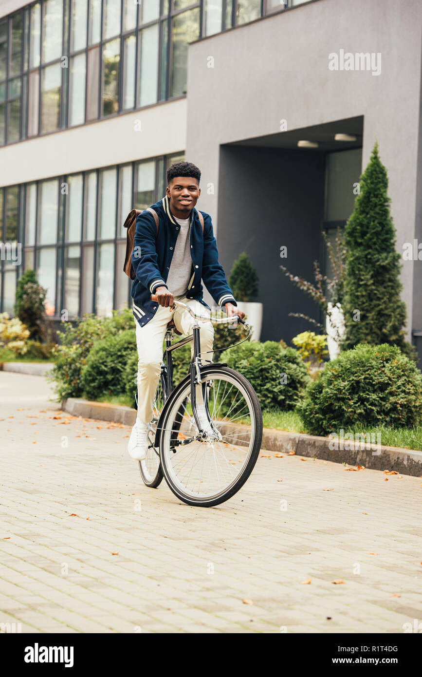 Man riding bicycle in city hi-res stock photography and images - Alamy