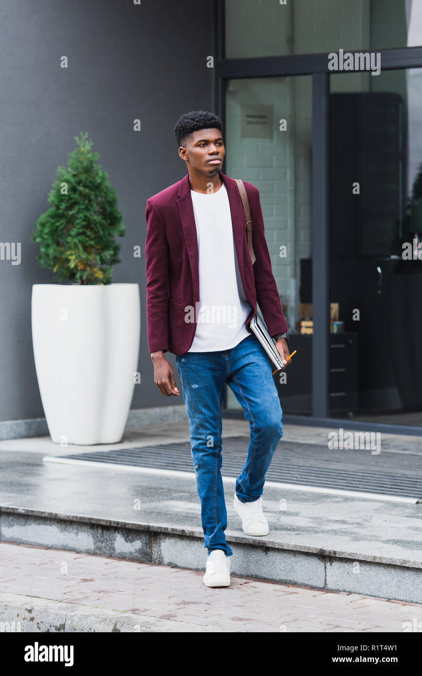 Handsome male red backpack hi-res stock photography and images - Alamy
