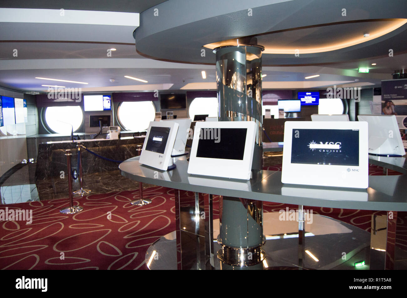 The reception area of the cruise liner with views of the monitors and a ...