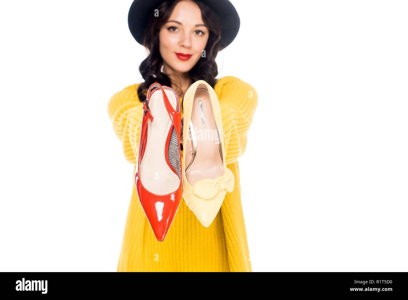 smiling attractive woman holding high heels isolated on white Stock ...