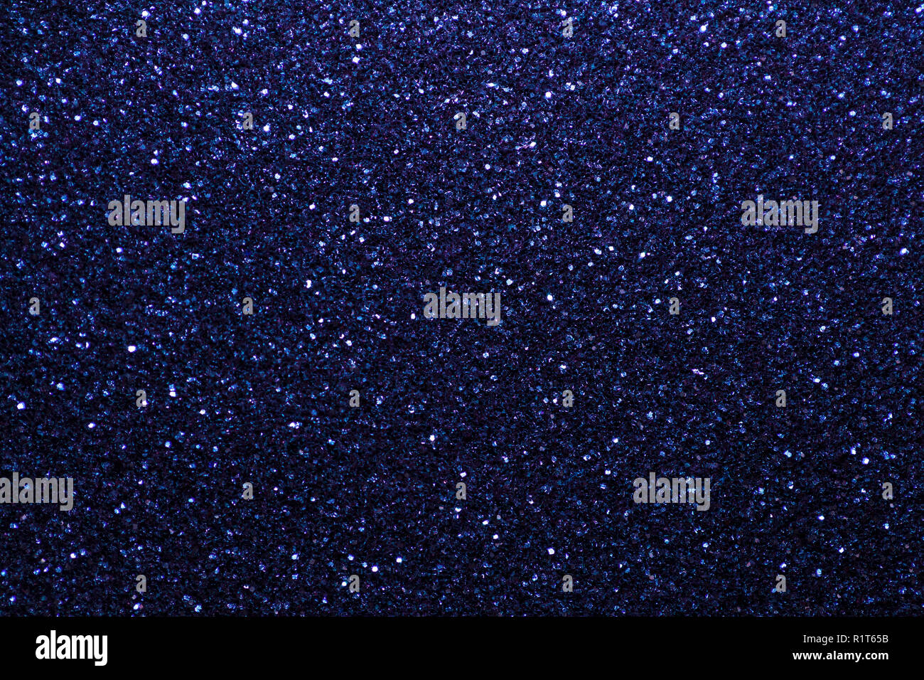 Navy blue sparkling background from small sequins, closeup. Brilliant ...