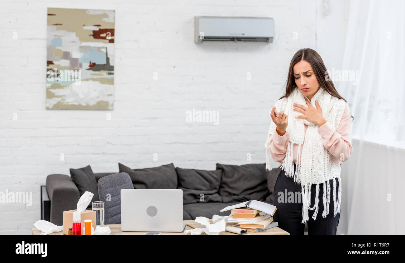 Female standing near table hi-res stock photography and images - Alamy