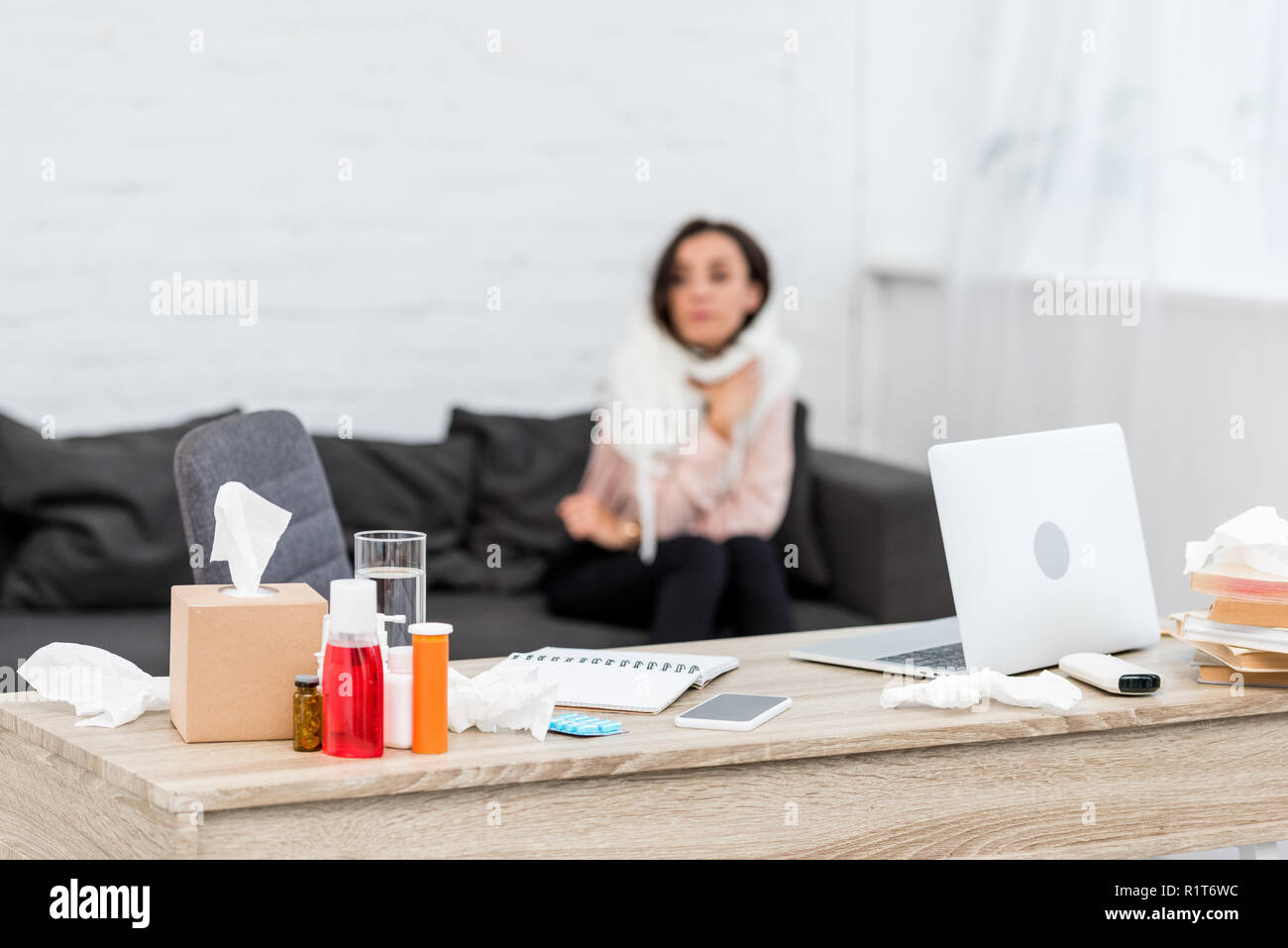 Woman sitting at desk cold hi-res stock photography and images - Alamy