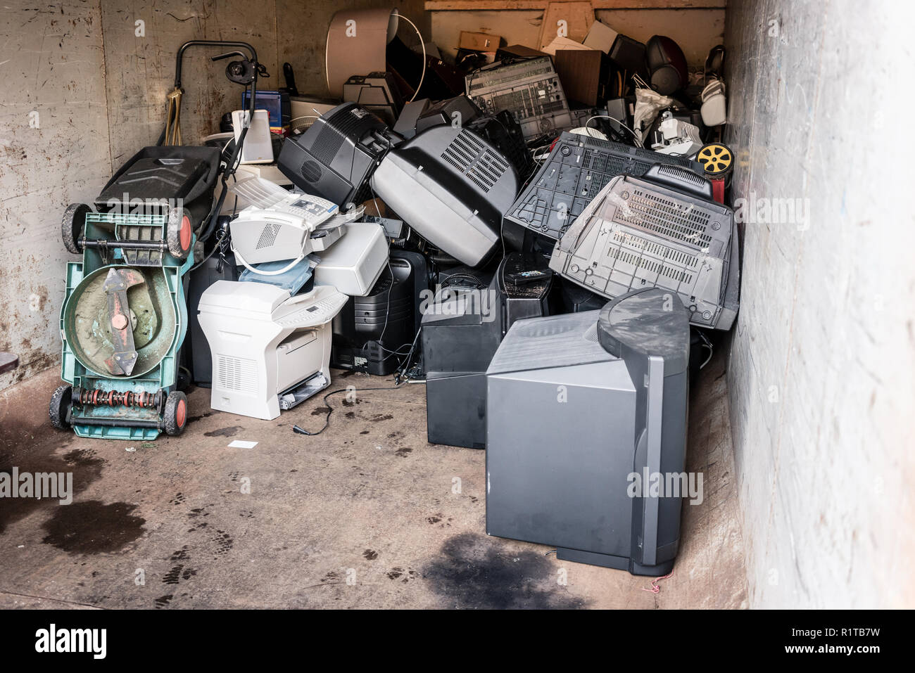 Old electrical appliances in container waiting to be recycled Stock ...