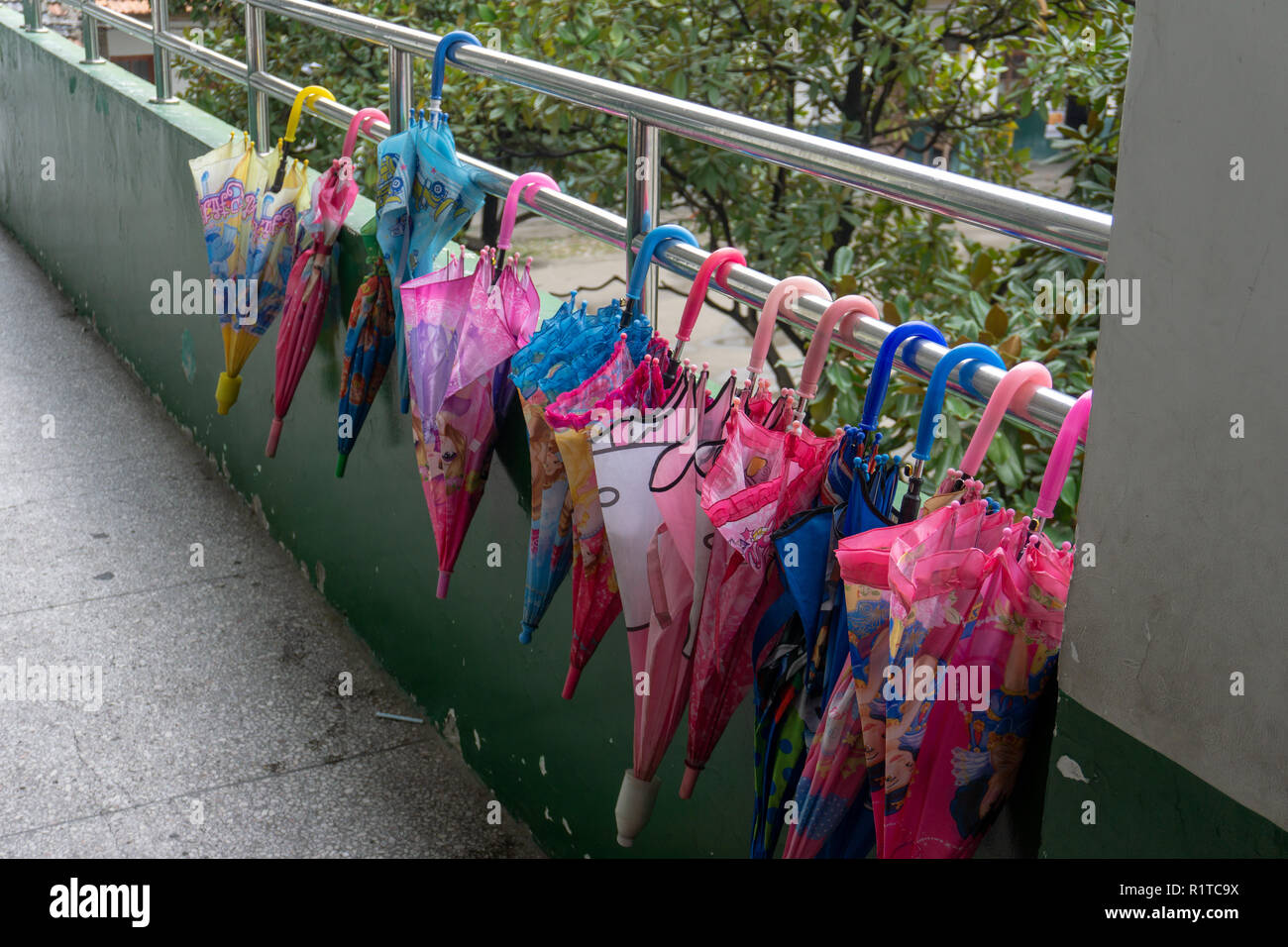 Colorful umbrellas hanging outside a classroom at the Cenhe Primary ...