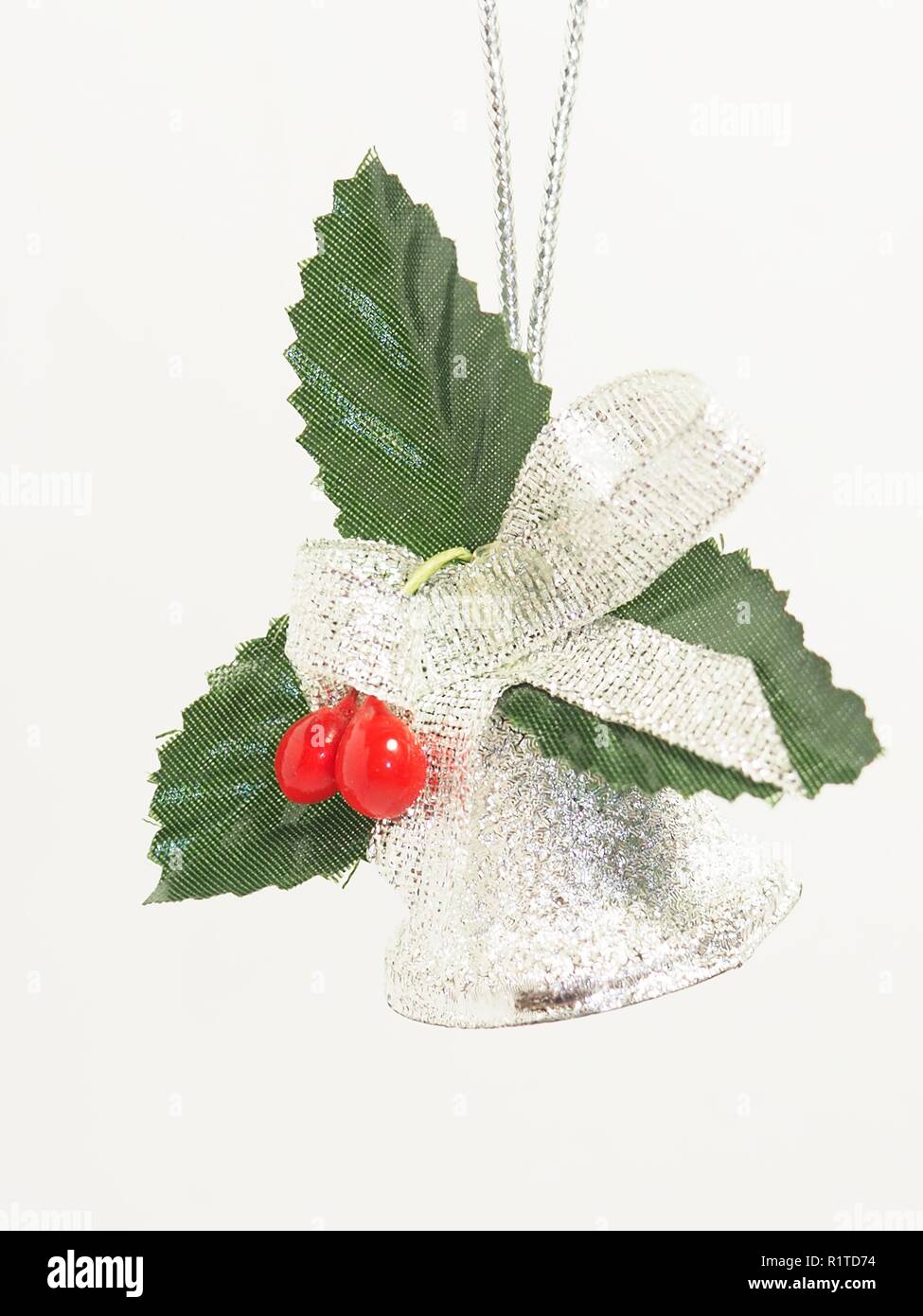 Silver Christmas bell isolated on white background Stock Photo - Alamy