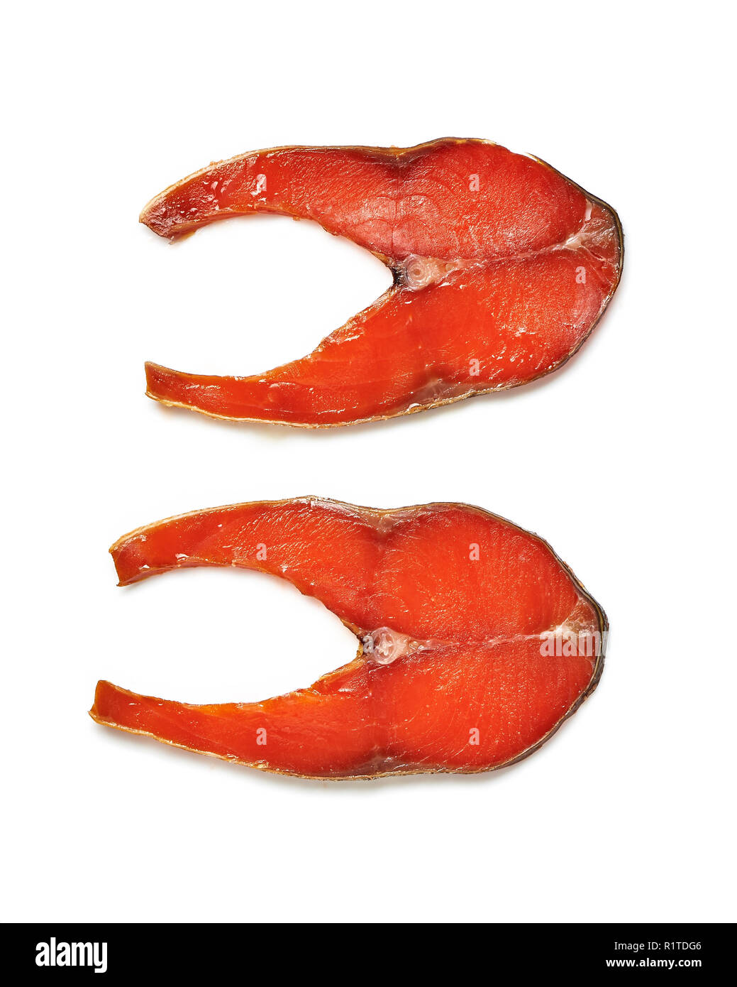 Slices of smoked red salmon isolated on white background. Top view ...