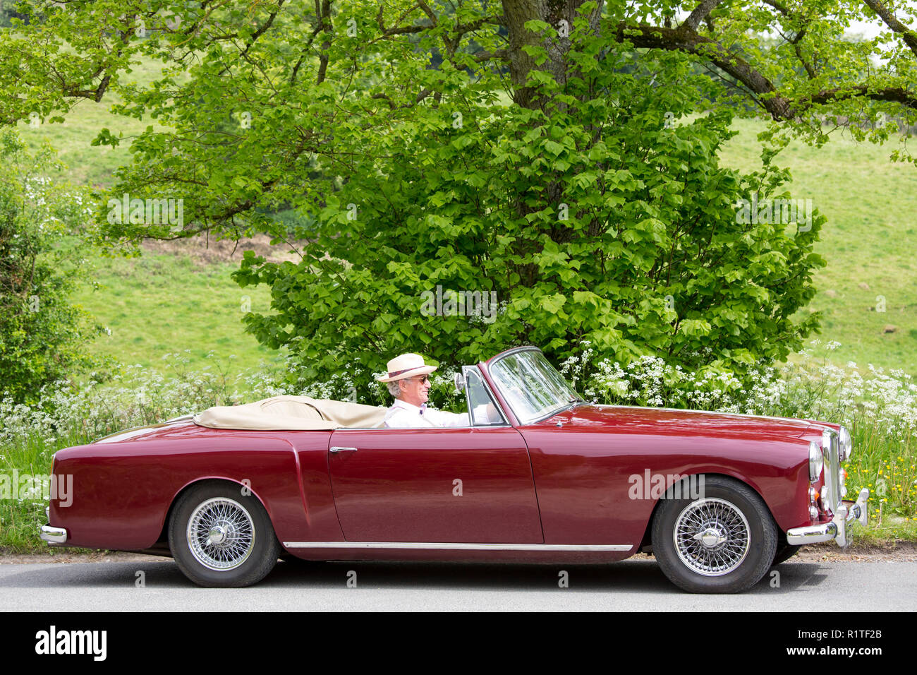 Motorist driving 1961 British made Alvis TD21 DHC Series 1 drophead ...