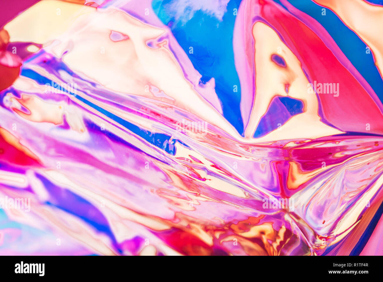 Bright holographic foil background. Multicolored and pastel trendy ...