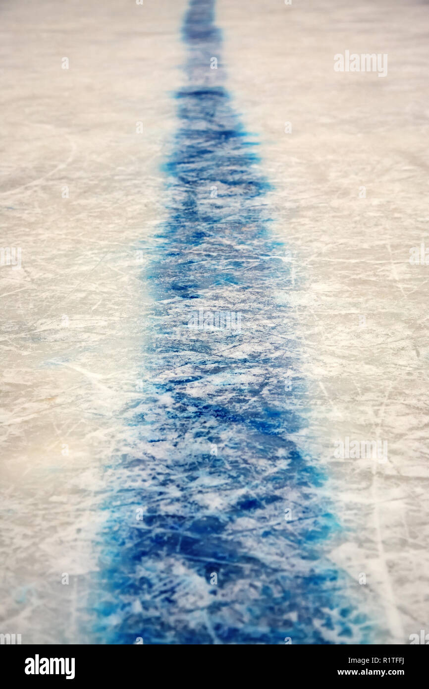 Hockey blue line on ice skating rink. winter sport background Stock ...