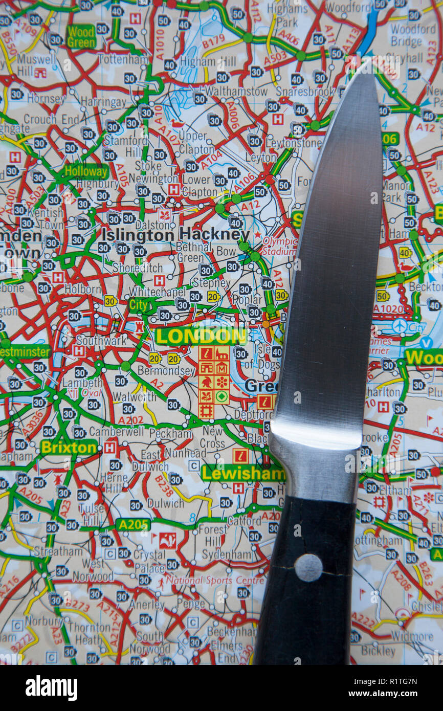 LONDON, UK - NOVEMBER 14th 2018: A knife on a map of London, England ...