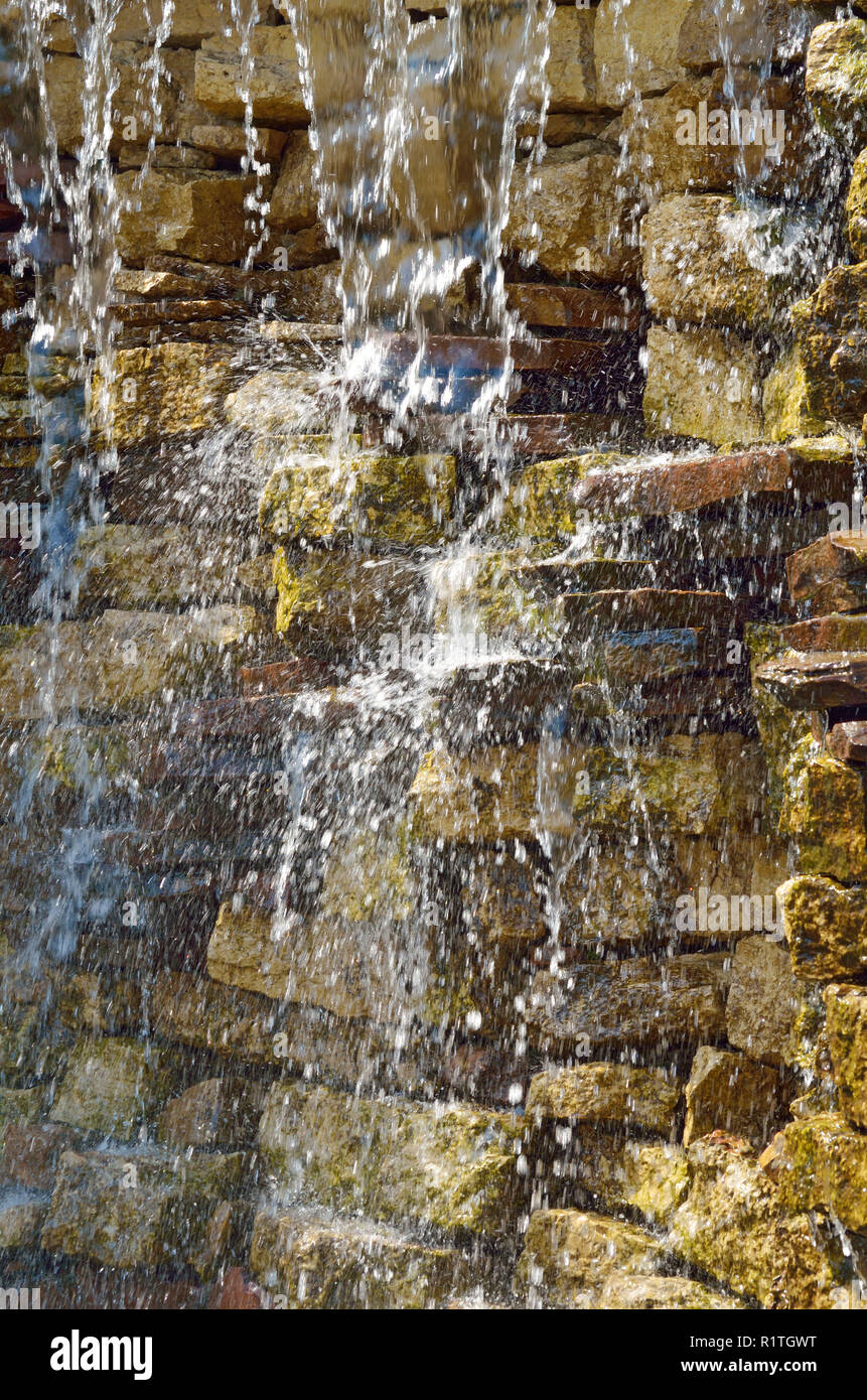 Water flows through stone wall hi-res stock photography and images - Alamy