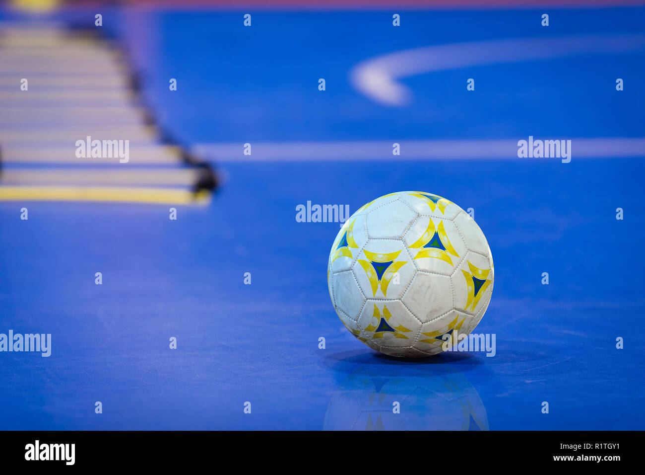 Futsal Ball on Blue Indoor Field. Blue Futsal Training Pitch. Training ...