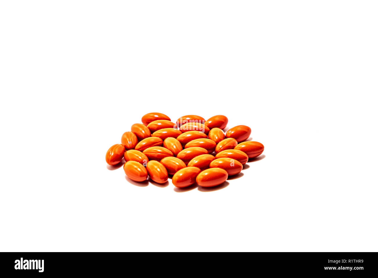Red vitamin pills Cut Out Stock Images & Pictures - Alamy