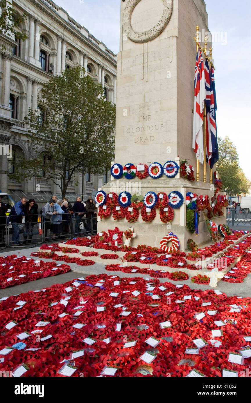 Poppy wreaths surround the Cenotaph, a 1920 war memorial on Whitehall ...