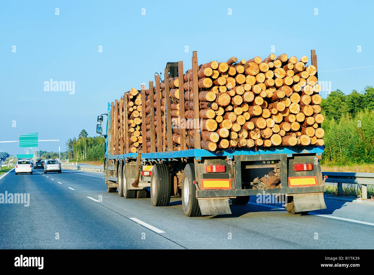 Timber lorry driving highway hi-res stock photography and images - Alamy