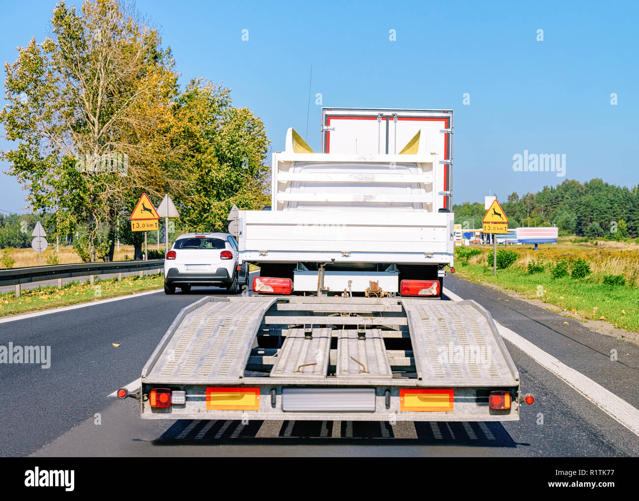 Empty Truck trailer at the highway asphalt road in Poland. Truck ...