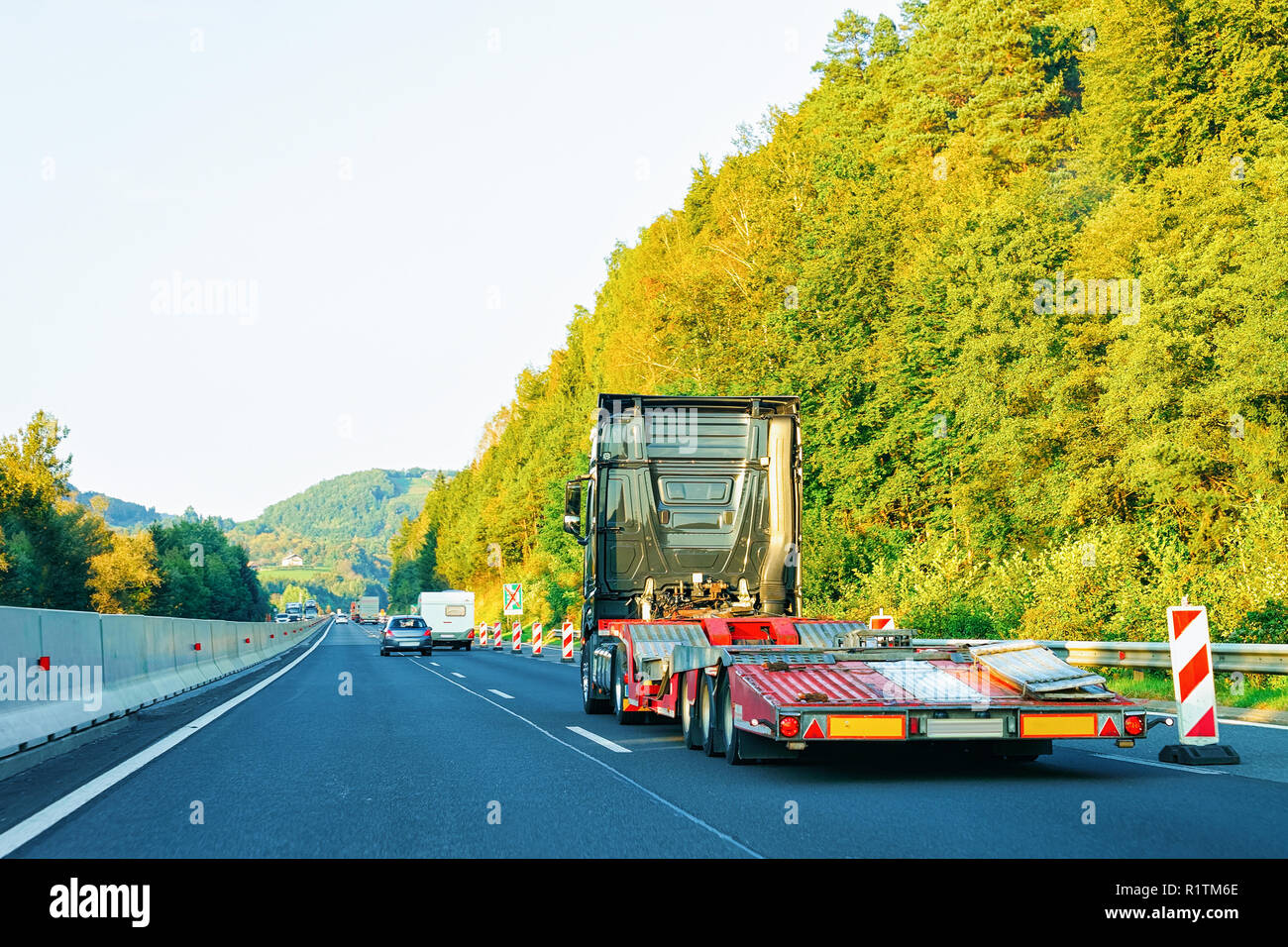 Empty carrier truck on the highway asphalt road in Poland. Truck ...