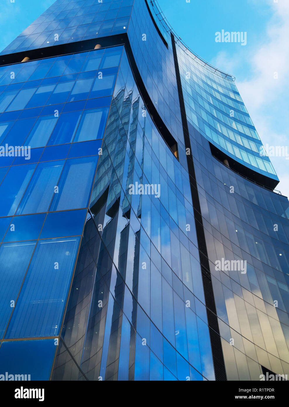 Modern round office building with windows Stock Photo - Alamy