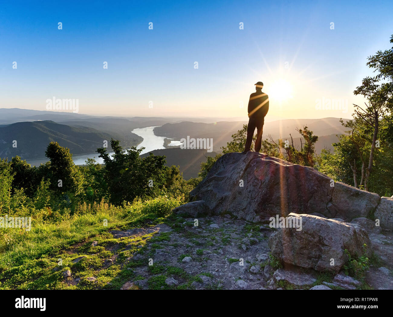 Hiker silhouette on rock ridge hi-res stock photography and images - Alamy