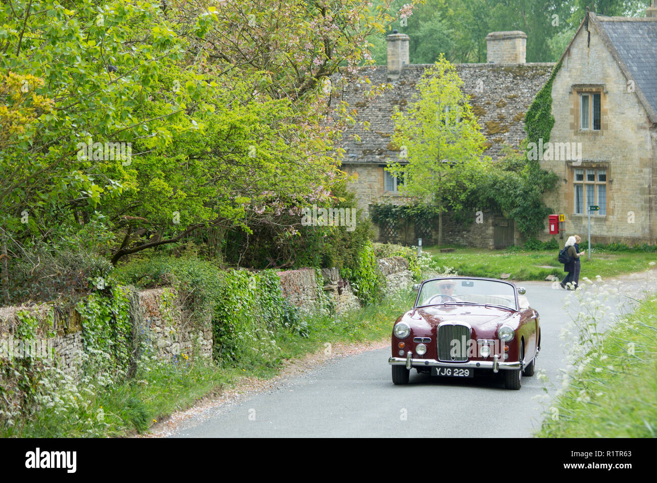 Motorist driving 1961 British made Alvis TD21 DHC Series 1 drophead ...