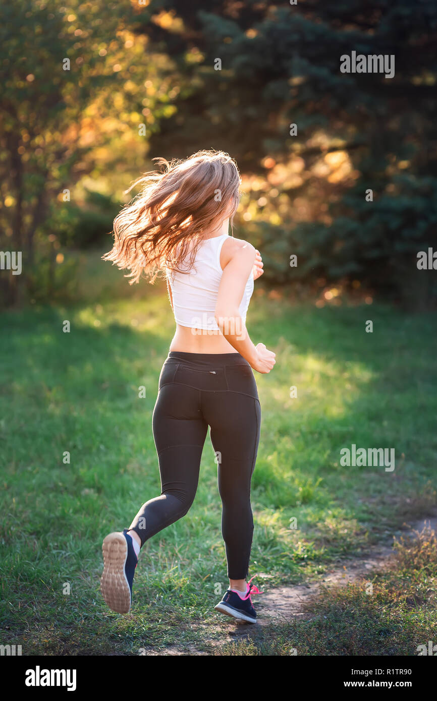 Running jogging at the park hi-res stock photography and images - Alamy